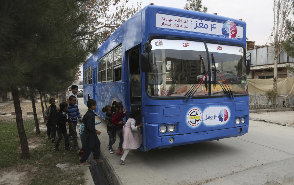 PHOTOS: Blue bus of Kabul brings joys of reading to Afghan children ...