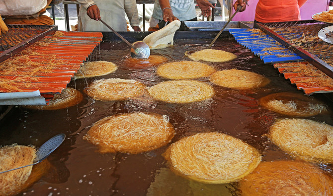 At Karachi’s iconic food street, favorite Ramadan snacks trace origins ...