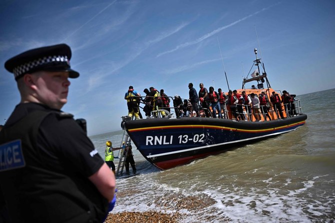 Record number of migrants arrive in Britain in boat crossings on a ...